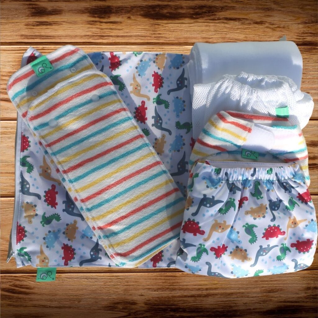 Handy nappy kit - TotsBots Dinosaur day to night nappy - Qookeee